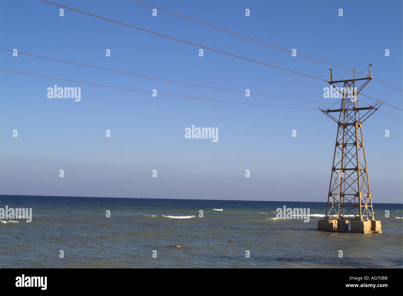 Egypt red sea quoseir village electrical one pylon in the sea Stock ...