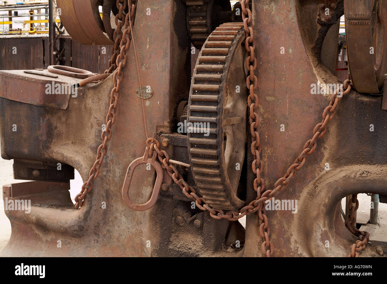 giant rusty wheel with cogs on historic belt driving machine Stock ...