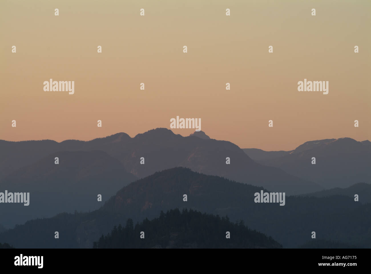 Mainland mountains at dusk Rebecca Spit Provincial Marine Park Quadra ...