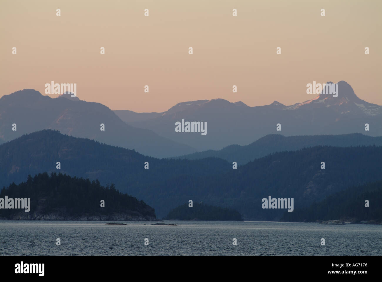 Mainland mountains at dusk Rebecca Spit Provincial Marine Park Quadra ...