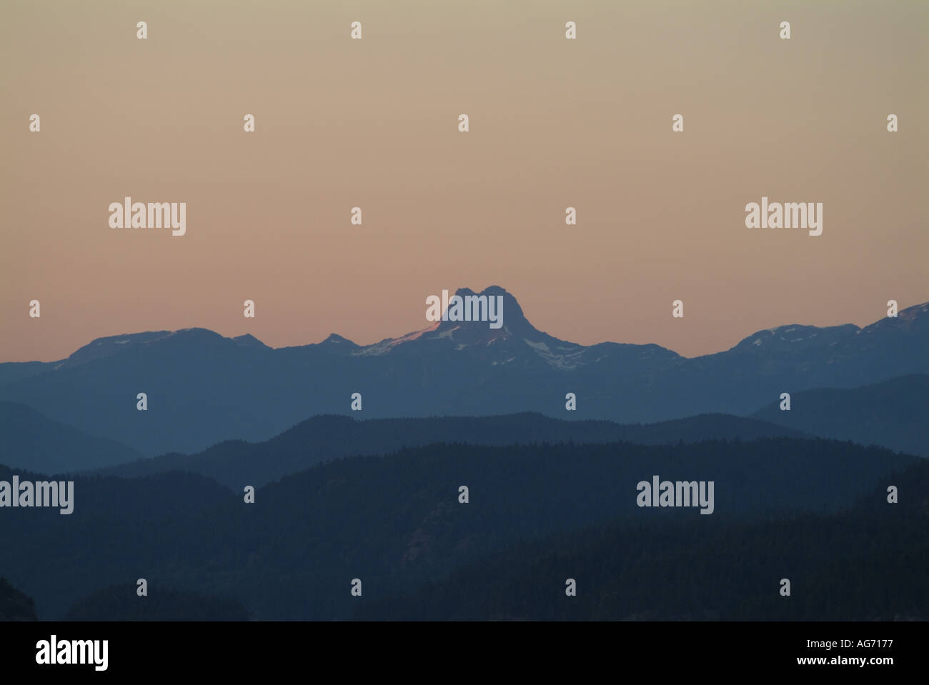 Mainland mountains at dusk Rebecca Spit Provincial Marine Park Quadra ...