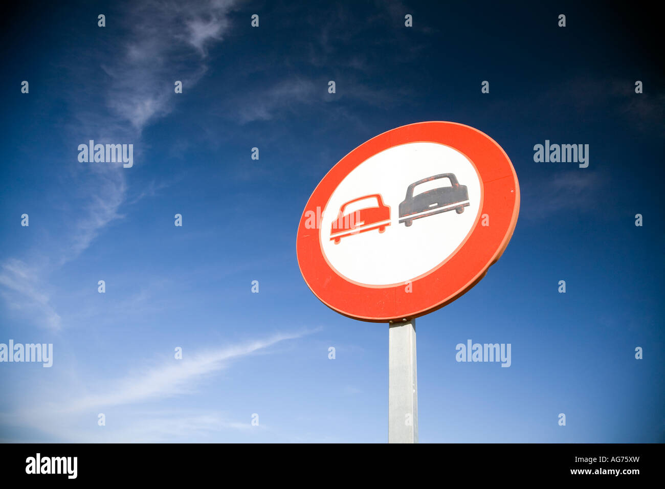 No passing traffic sign in front of a deep blue sky Spain Stock Photo ...