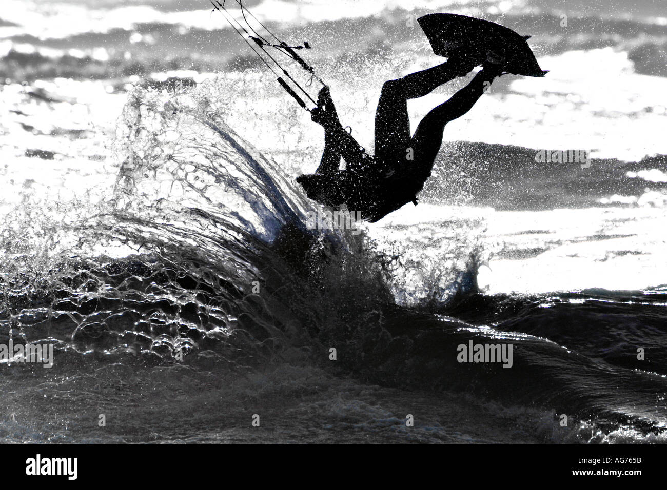Kite Surfer jumping over waves Compton Bay Isle of Wight England UK ...