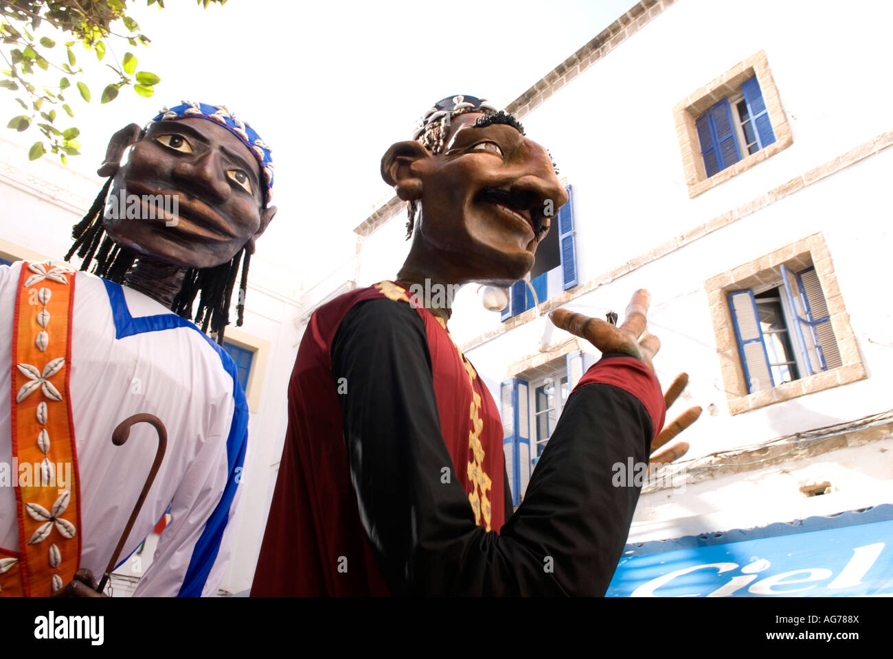 giant gnawa dolls parading at the Gnawa festival in Essaouira, Morocco ...