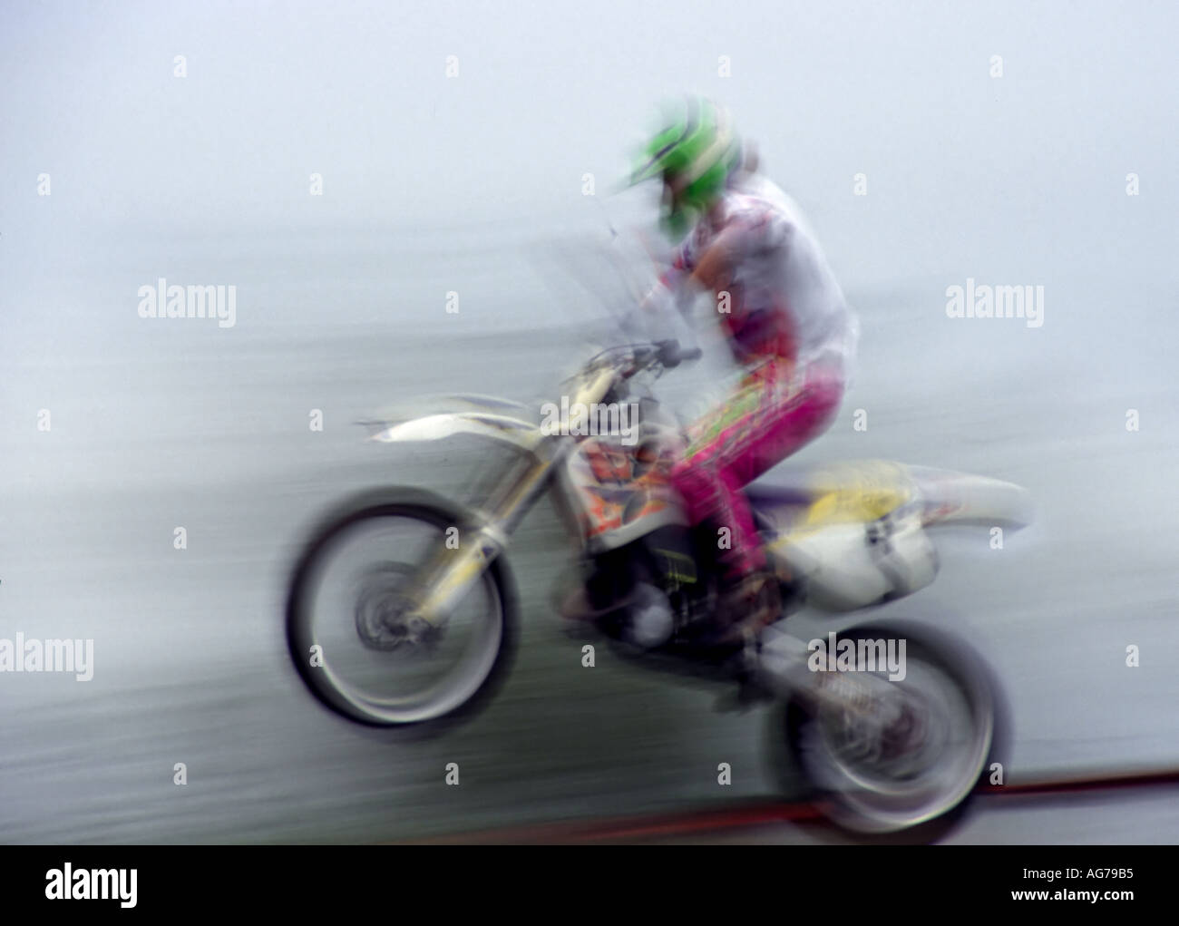 acrobatic jump with a motor cycle Stock Photo - Alamy