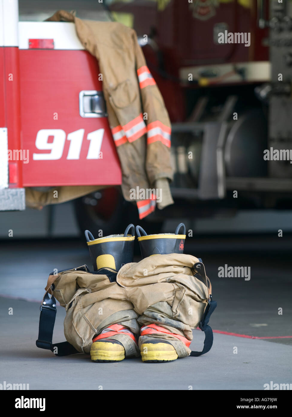 Firefighting uniforn with fire apparatus Stock Photo - Alamy