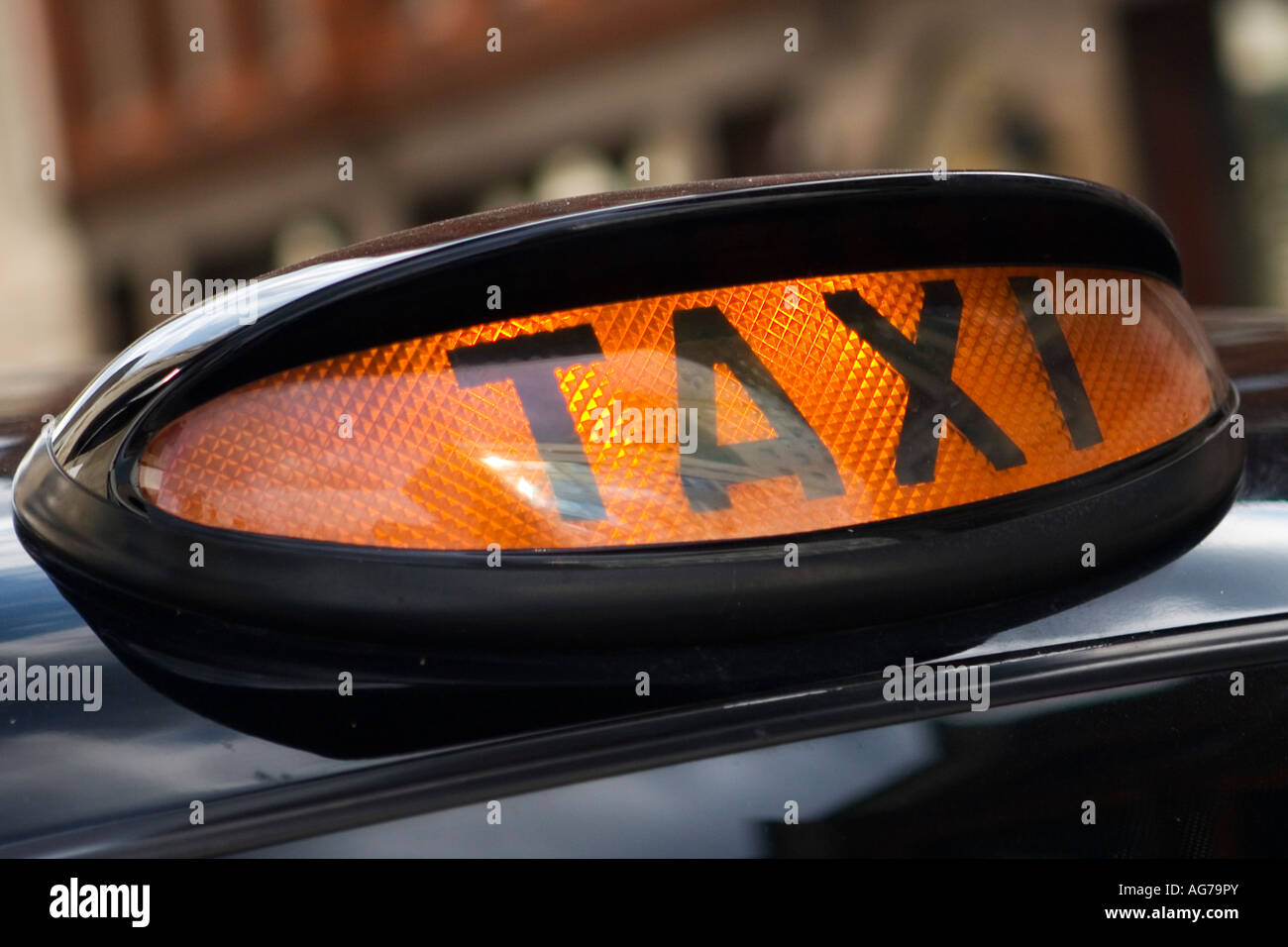Illuminated London Taxi sign showing the cab is for hire Stock Photo ...