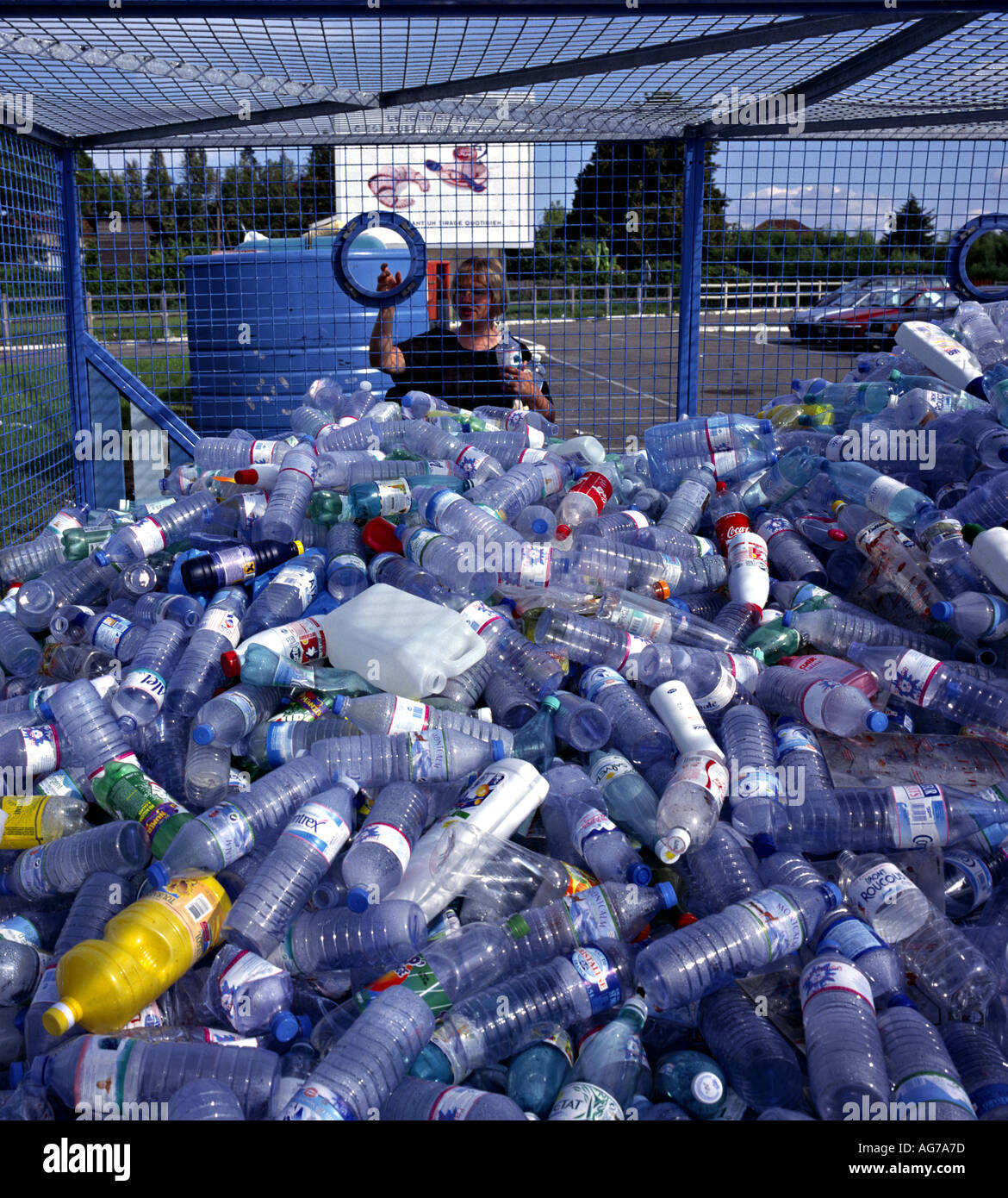 woman disposing plastic bottles Stock Photo - Alamy