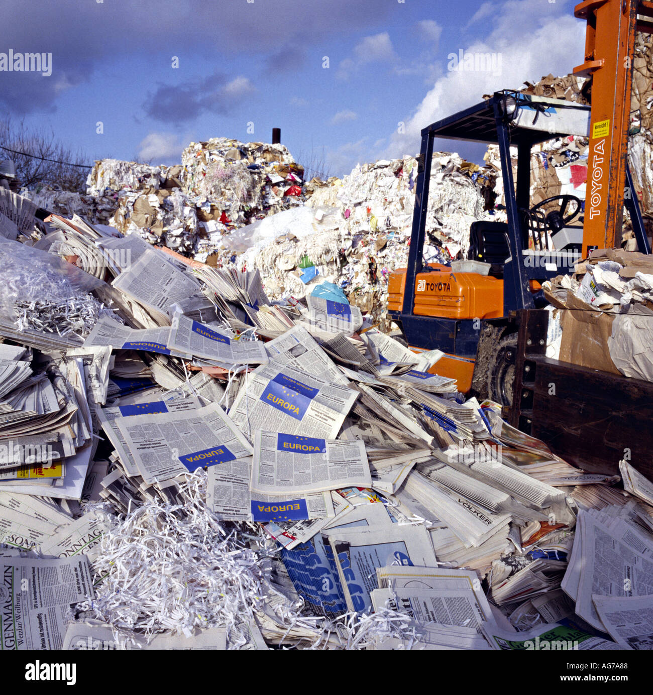 trasporting of waste paper for recycling Stock Photo - Alamy
