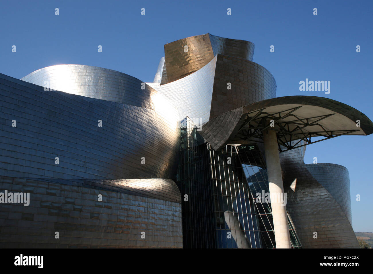 Detail of Frank Gehry's Titanium and glass Guggenheim Museum in Bilbao ...