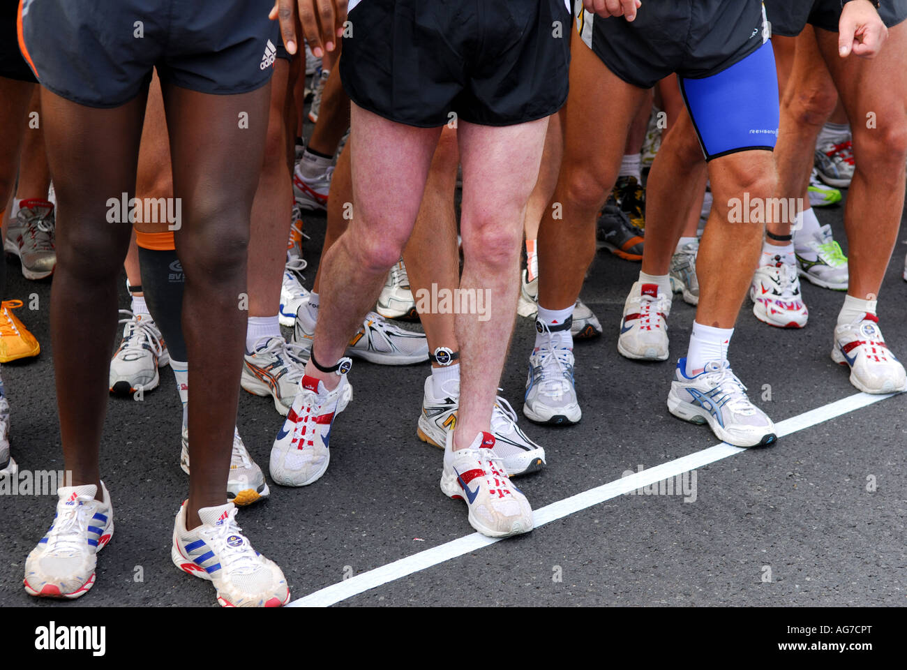 Marathon runners on start line Stock Photo - Alamy