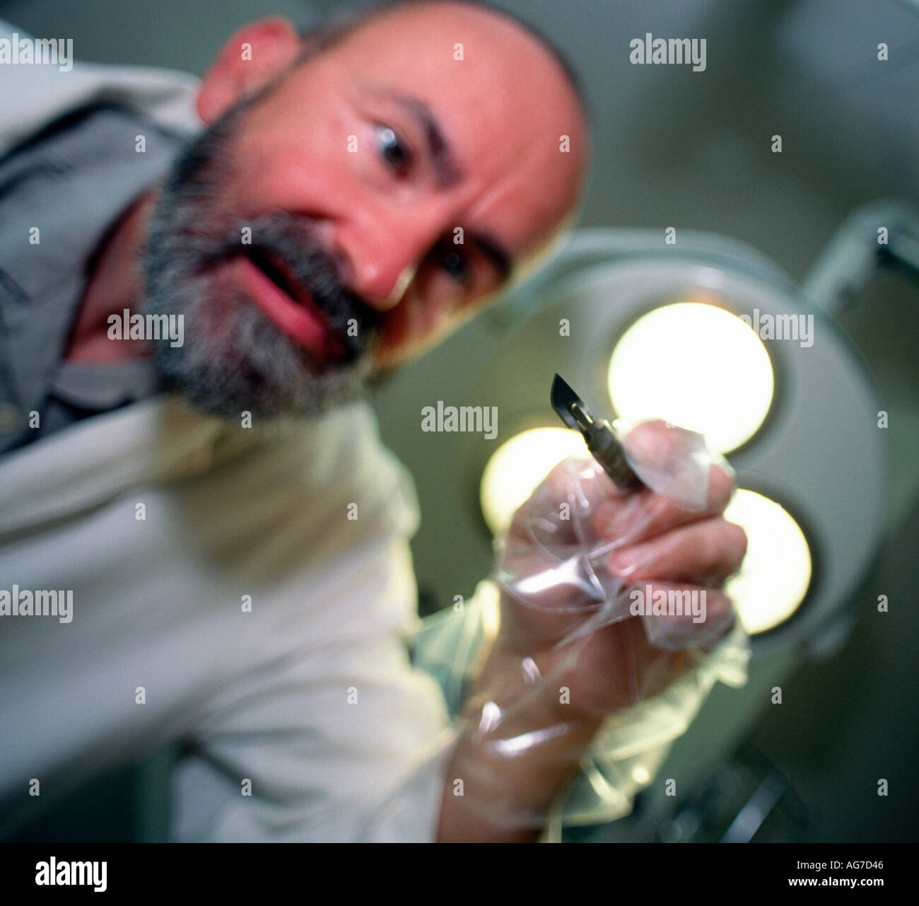 doctor with scalpel Stock Photo - Alamy