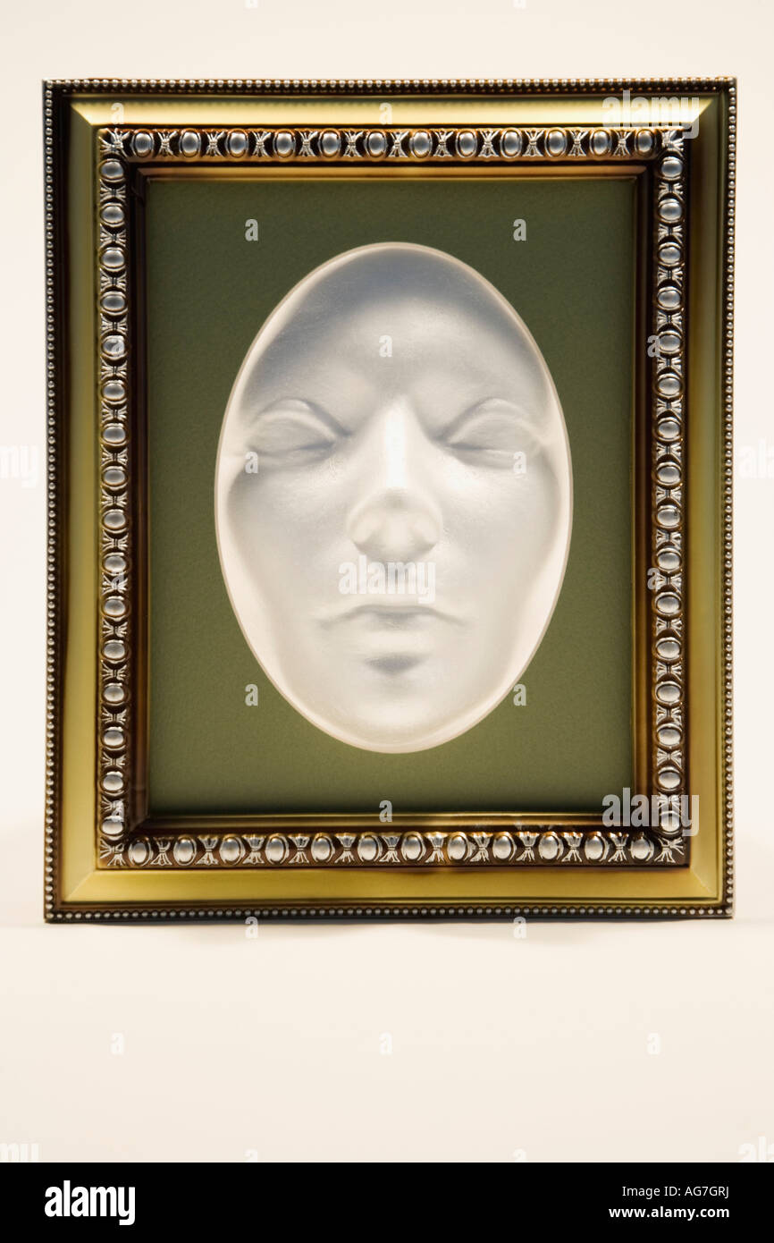 Mask in a picture frame Stock Photo - Alamy