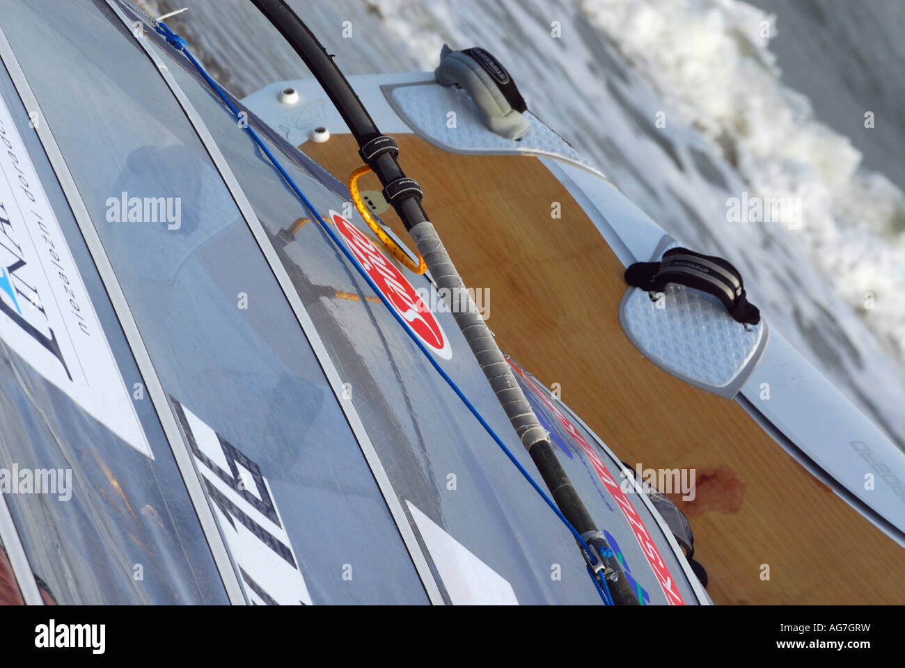 windsurfer board and sail lyying on the beach at san down on the isle ...