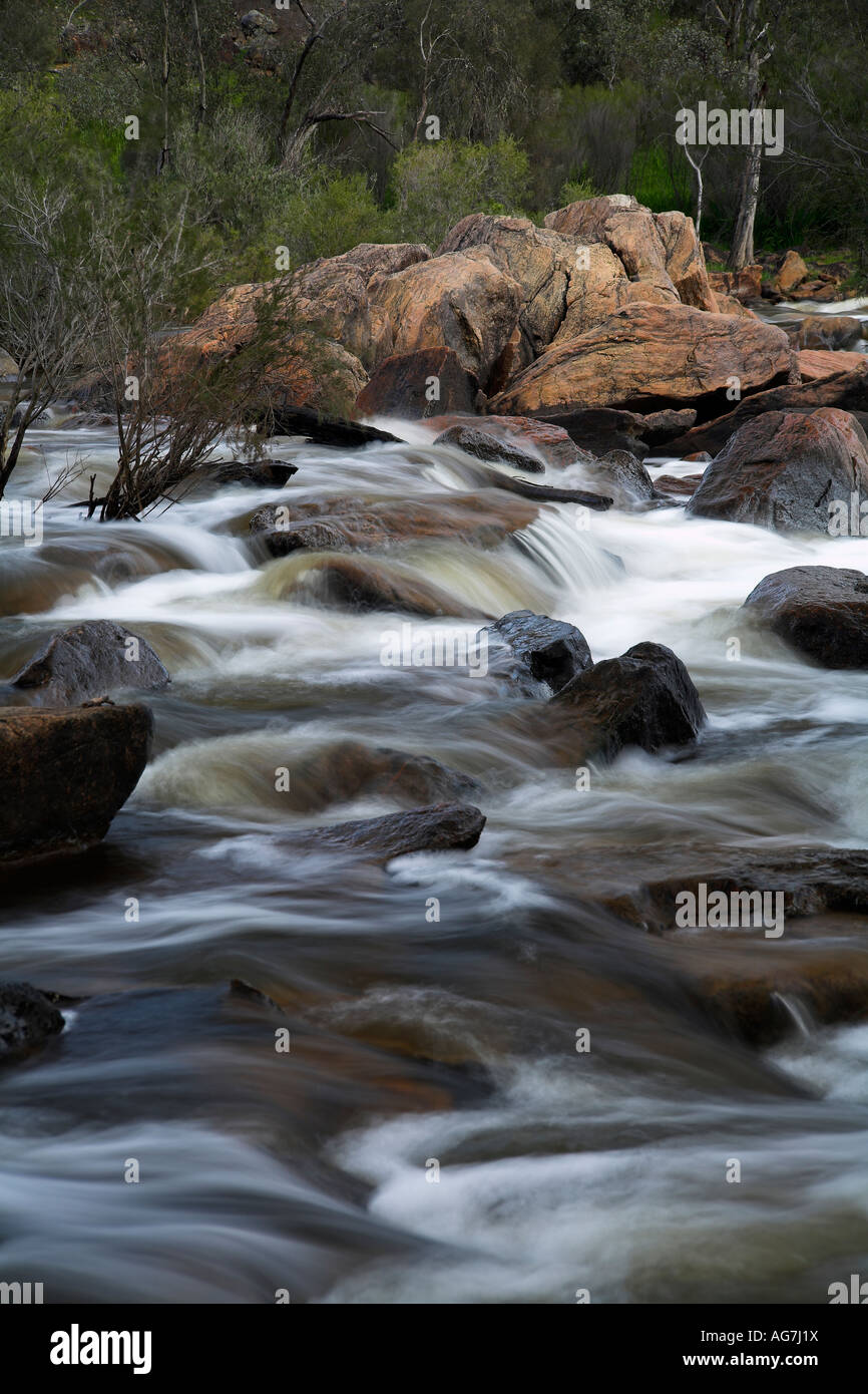 Australian river flowing over rapids Stock Photo - Alamy