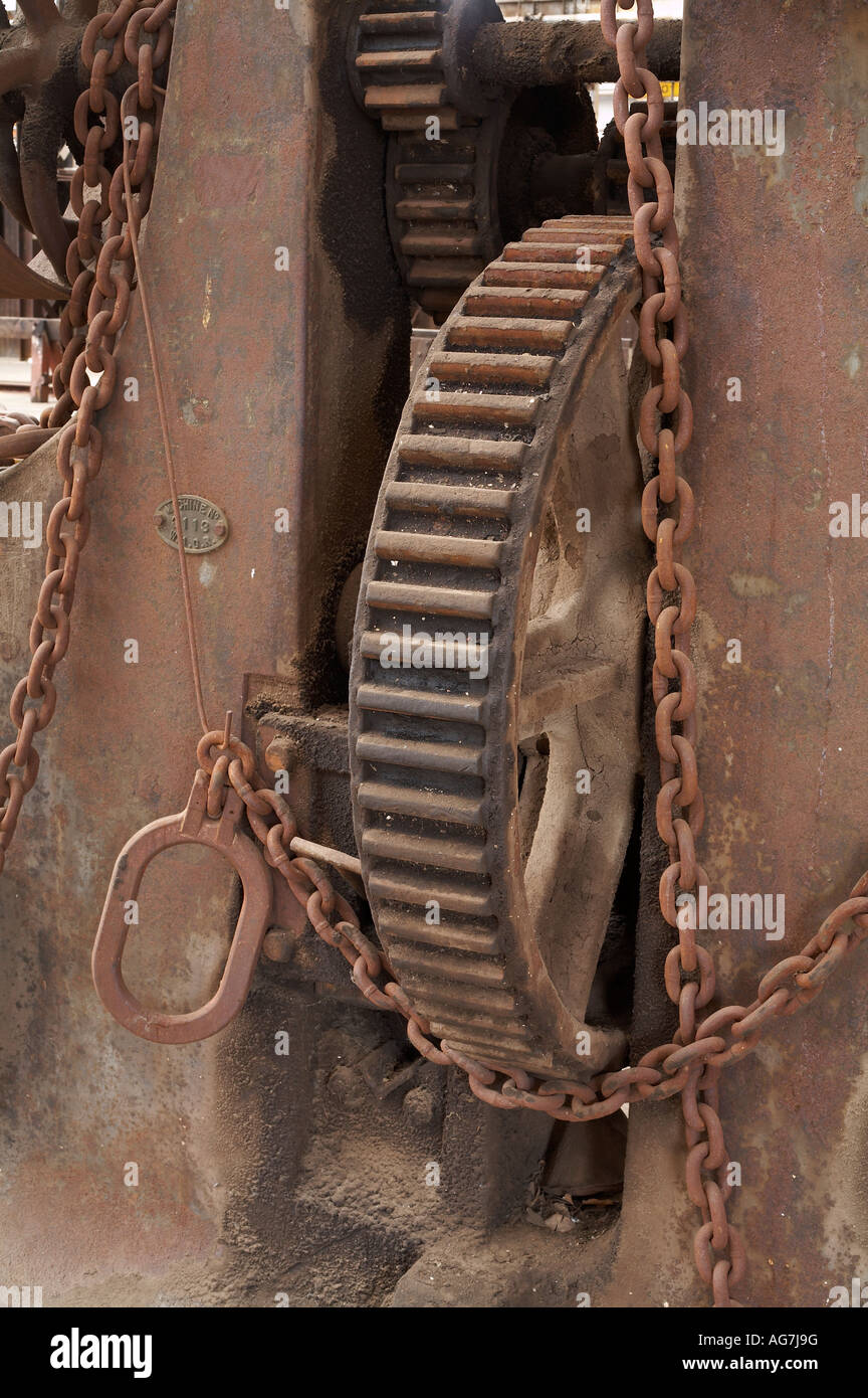 giant rusty wheel with cogs on historic belt driving machine Stock ...