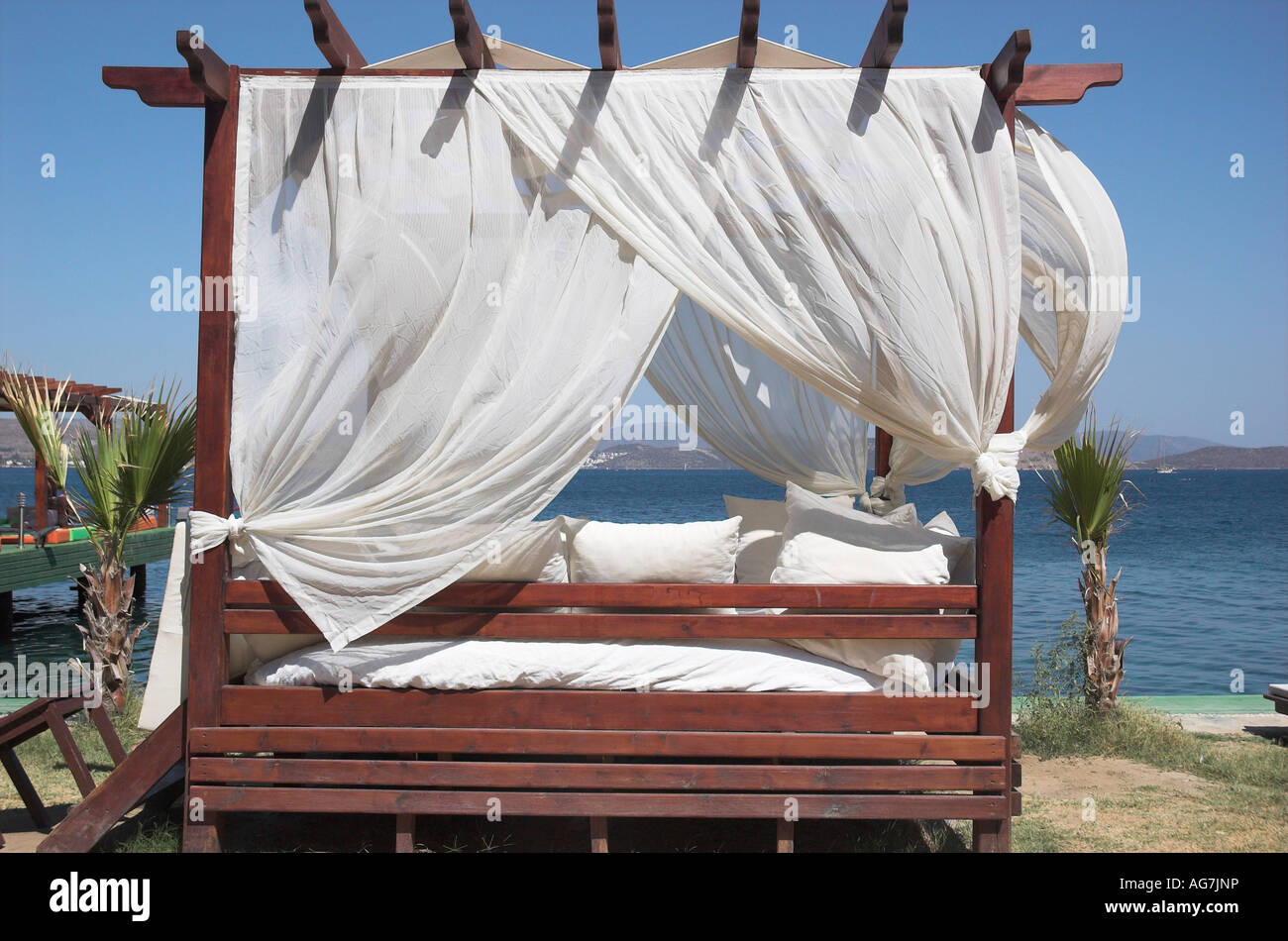 Bed with canopy on beach Turkey Bodrum August 2007 Stock Photo - Alamy
