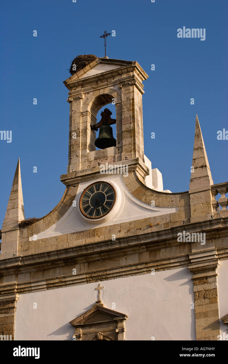 Bell tower and clock above Arco da Vila Faro Algarve Portugal Stock ...