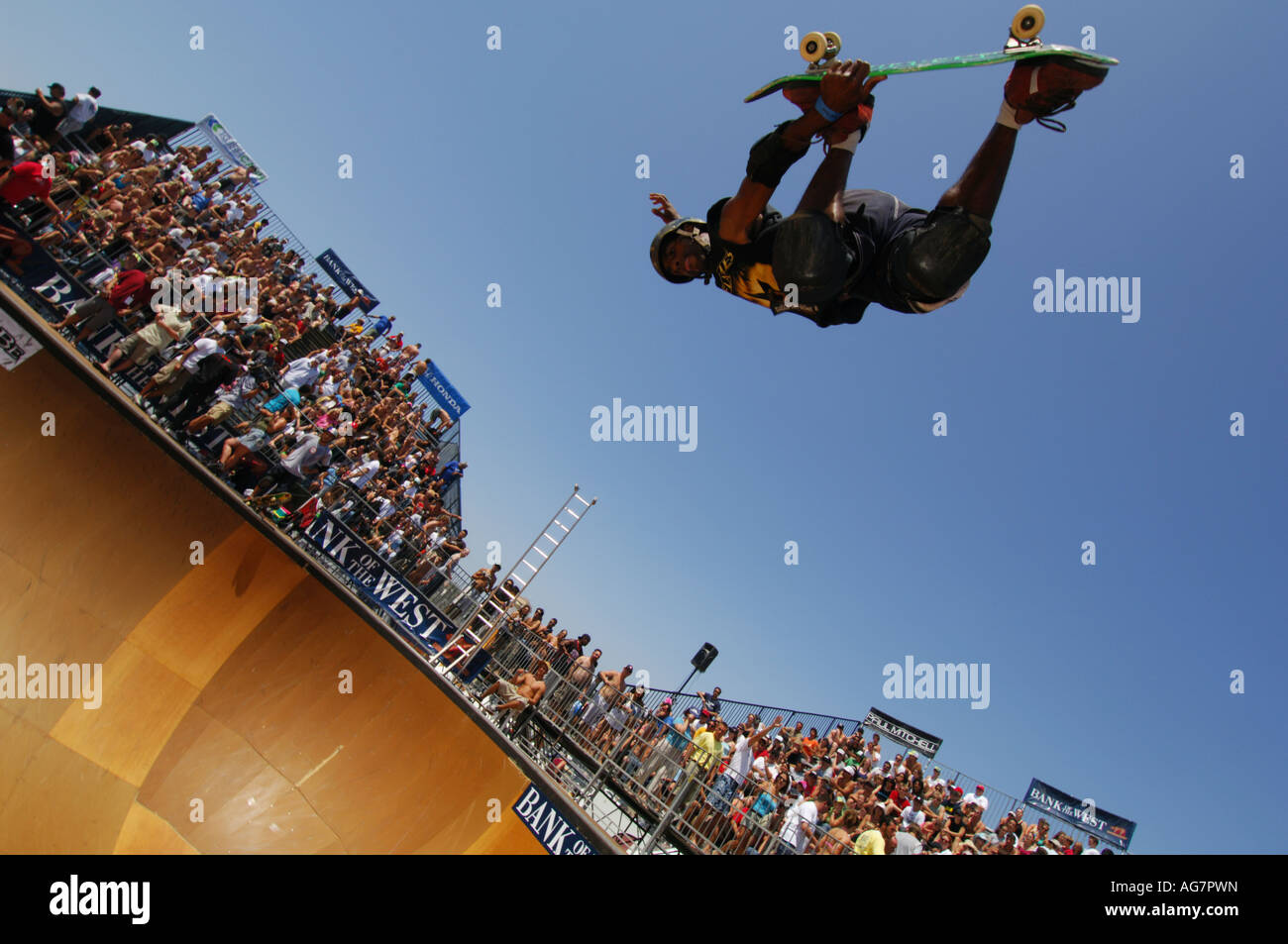 skate boarding action on a swimming pool like ramp California Stock ...