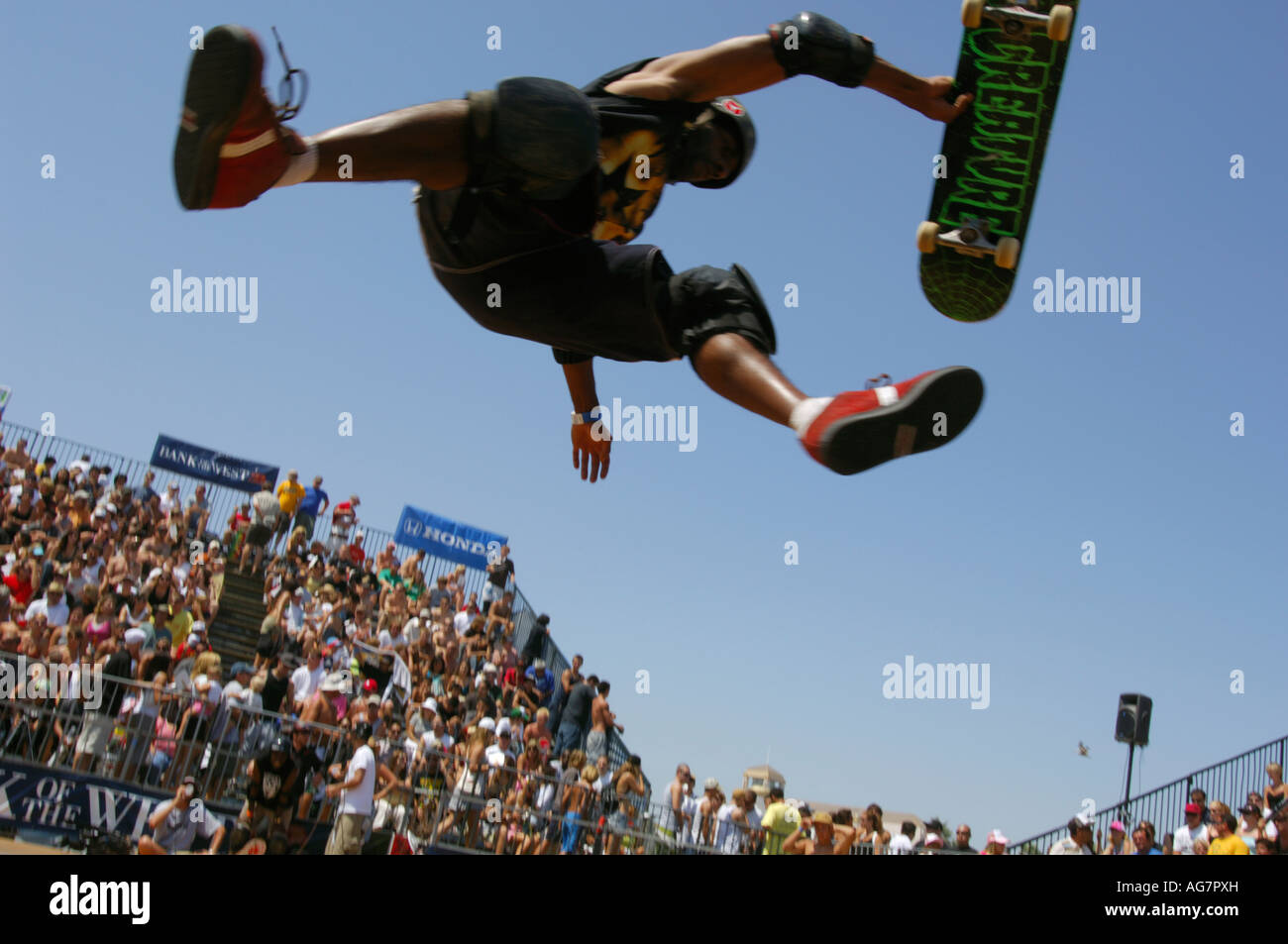 skate boarding action on a swimming pool like ramp California Stock ...