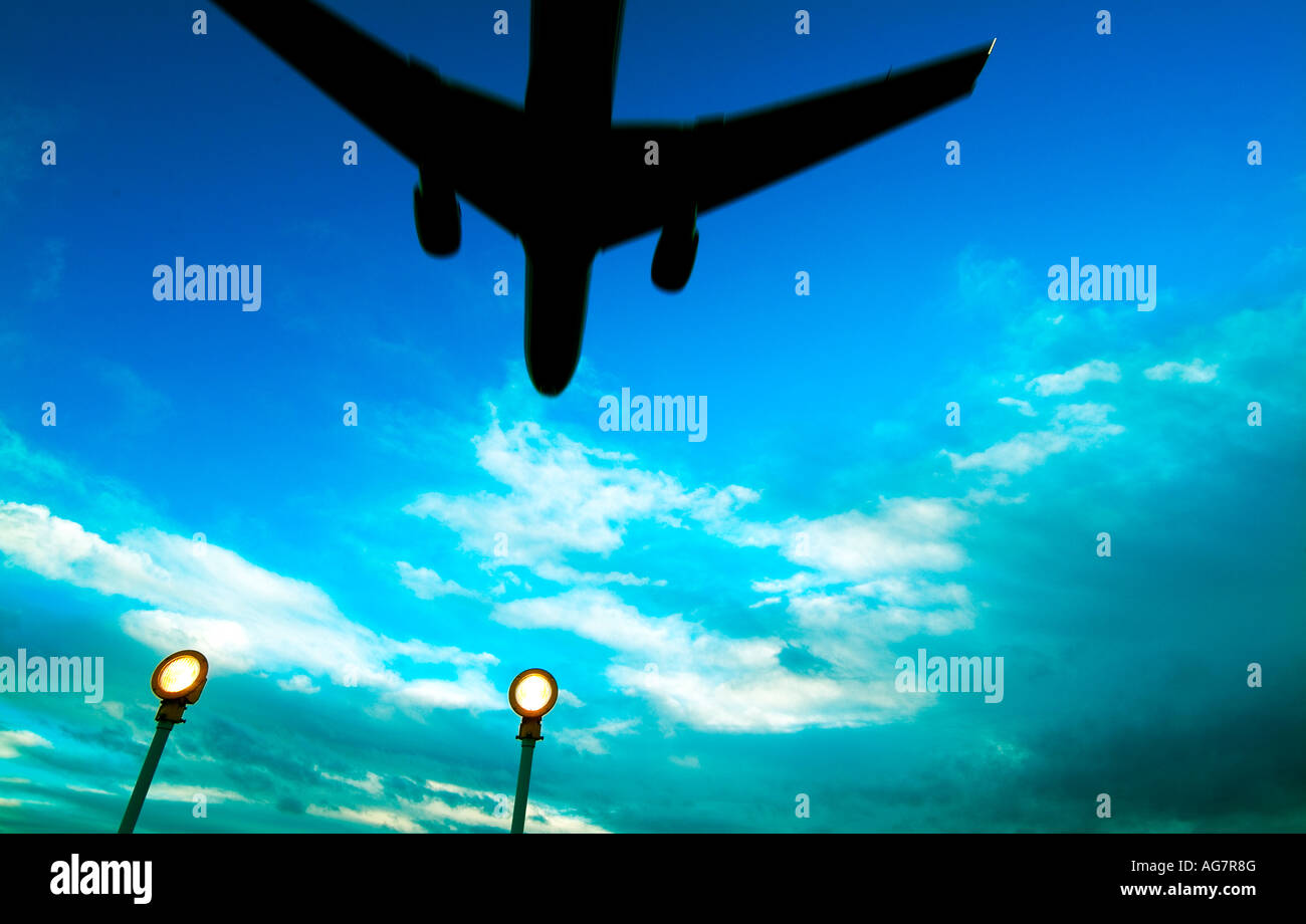Boeing 737 landing over ILS lights on runway Stock Photo - Alamy