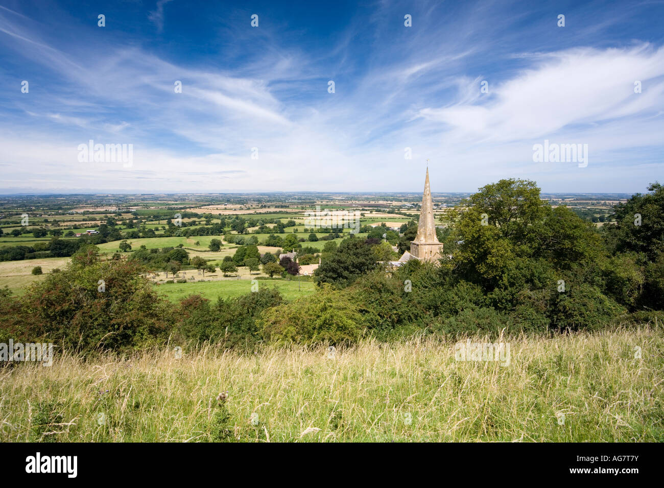 Looking across the church of St Nicholas in the Cotswold village of ...