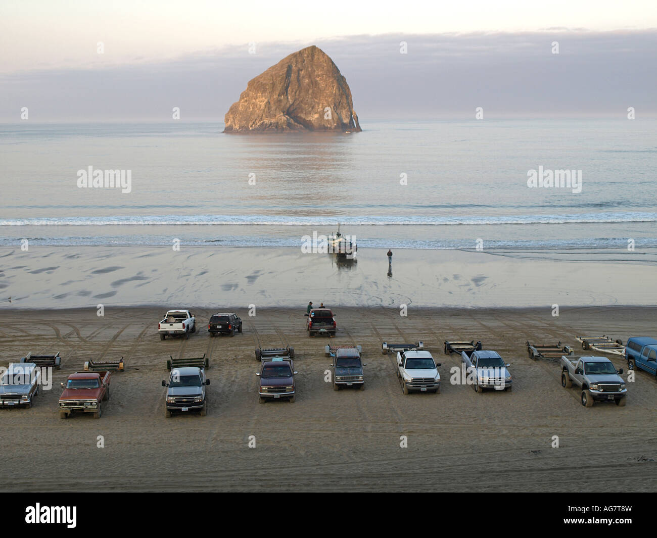 A view of the Pacific City dory fishing fleet launching from the beach ...