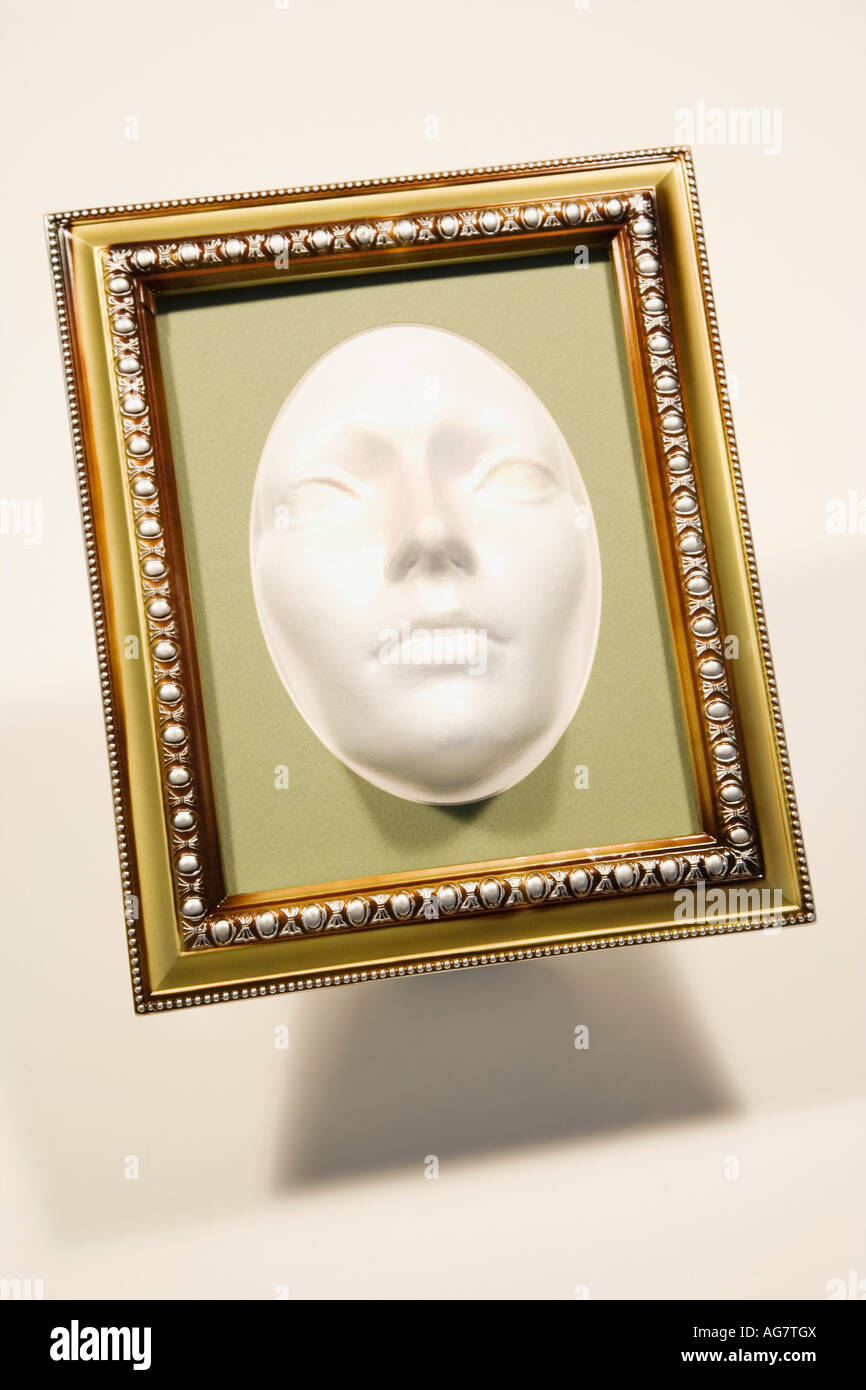 Mask in a picture frame Stock Photo - Alamy