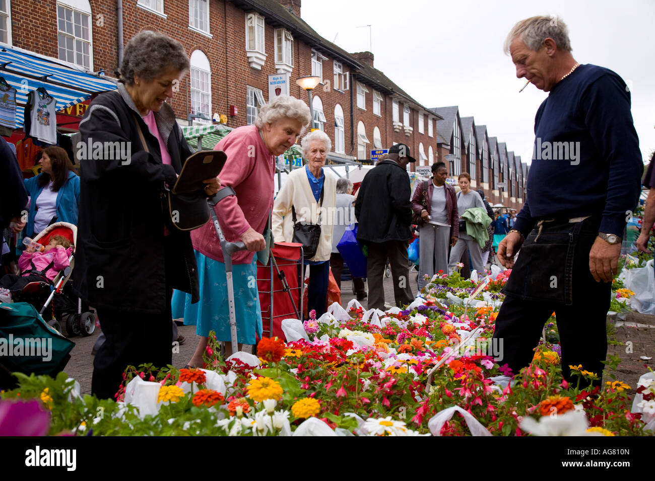 Walthamstow street market vendors and customers, London Stock Photo - Alamy