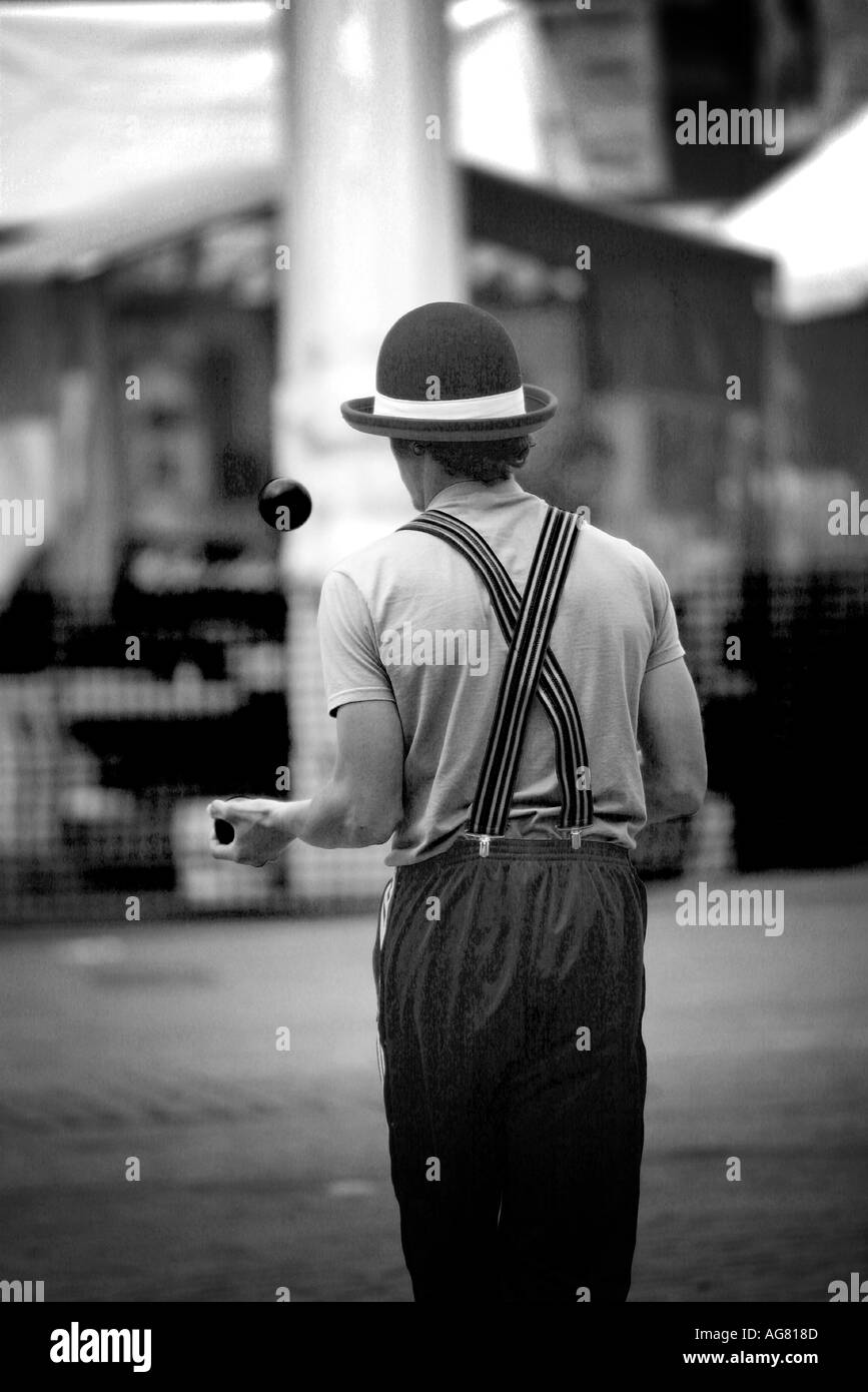 A juggler practices juggling at the Portland Saturday Market in ...
