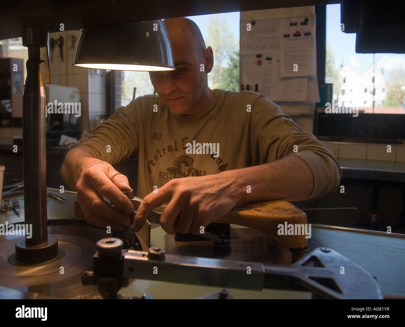 Diamond cutter working in the Netherlands Amsterdam Diamond District ...