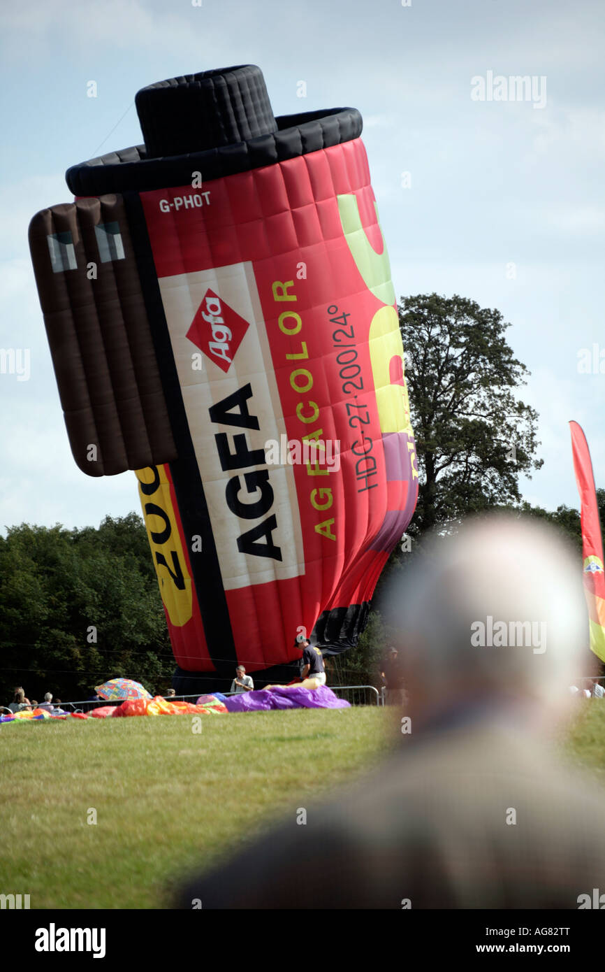 A hot air balloon in the shape of a 35mm camera color negative film ...