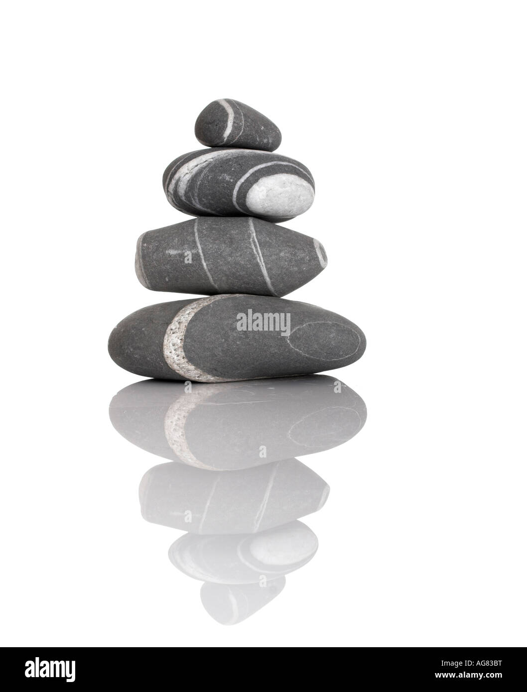 Stack of balanced stones on a white background Stock Photo - Alamy