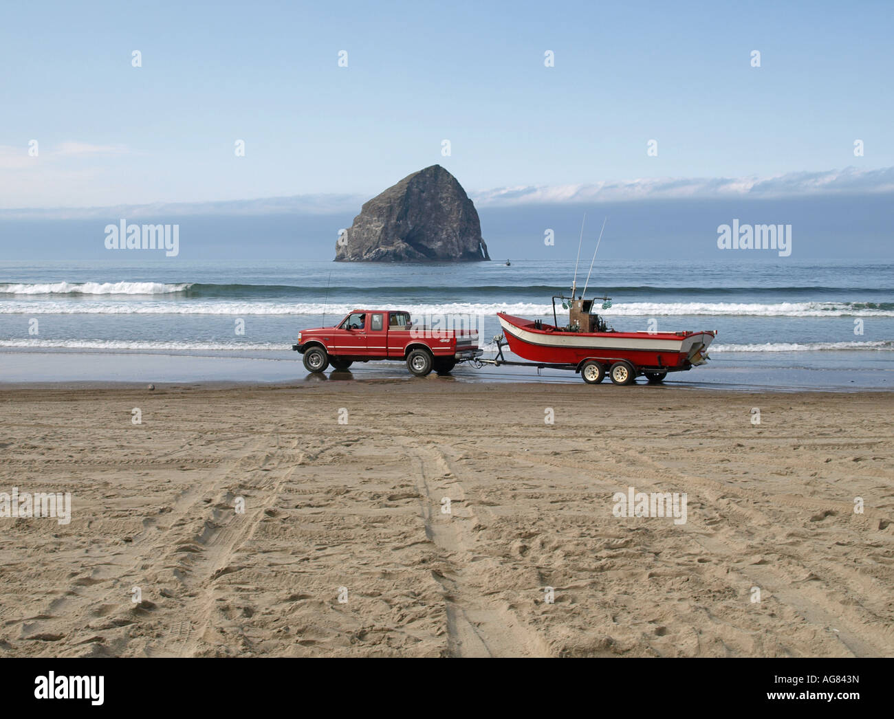 A view of the Pacific City dory fishing fleet launching from the beach ...