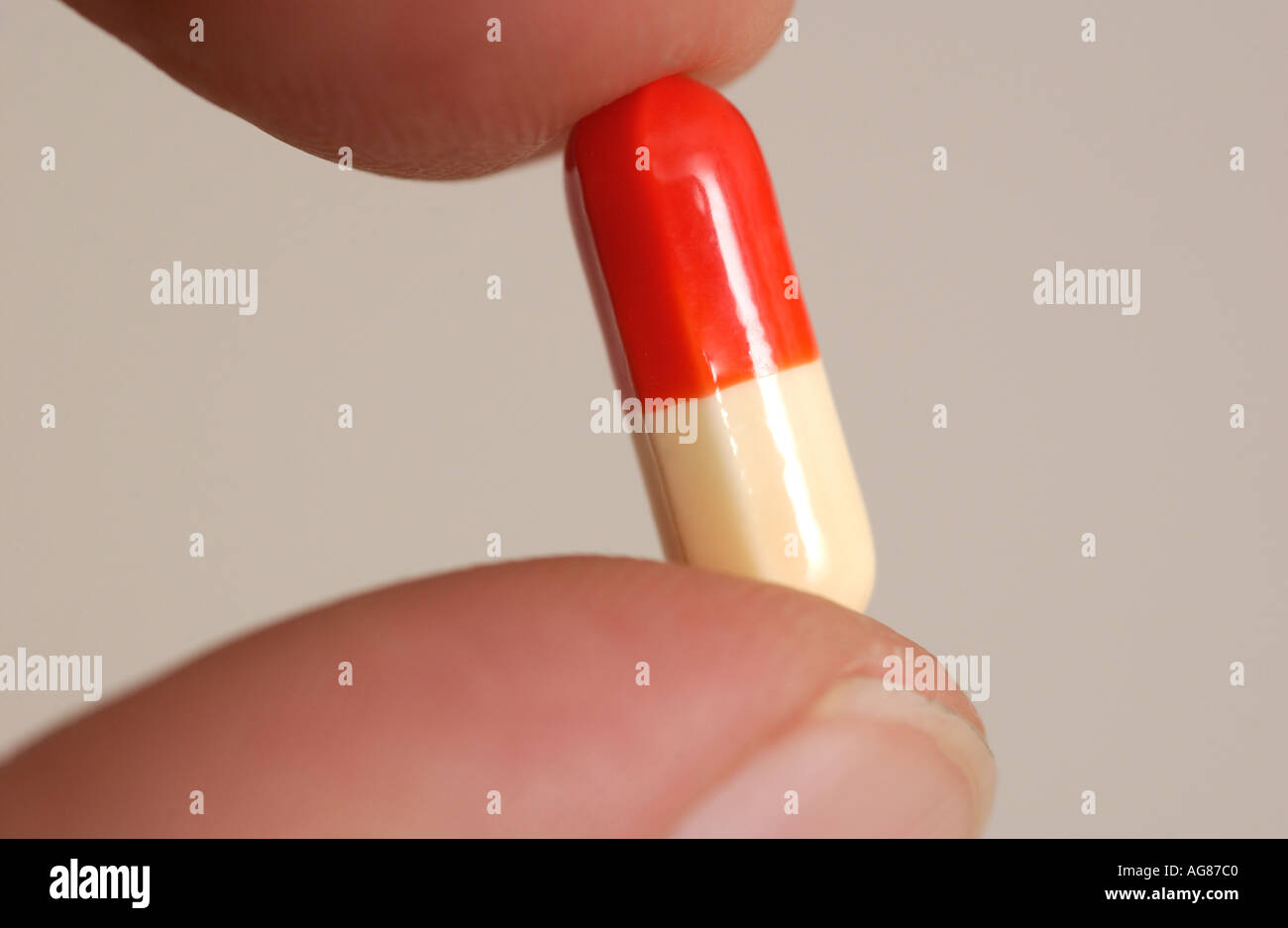 Holding capsule hi-res stock photography and images - Alamy