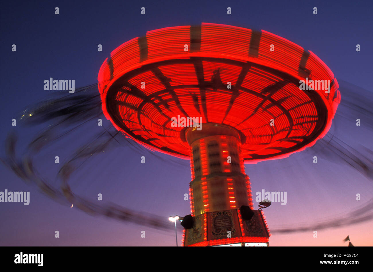 Spinning carnival ride Stock Photo - Alamy