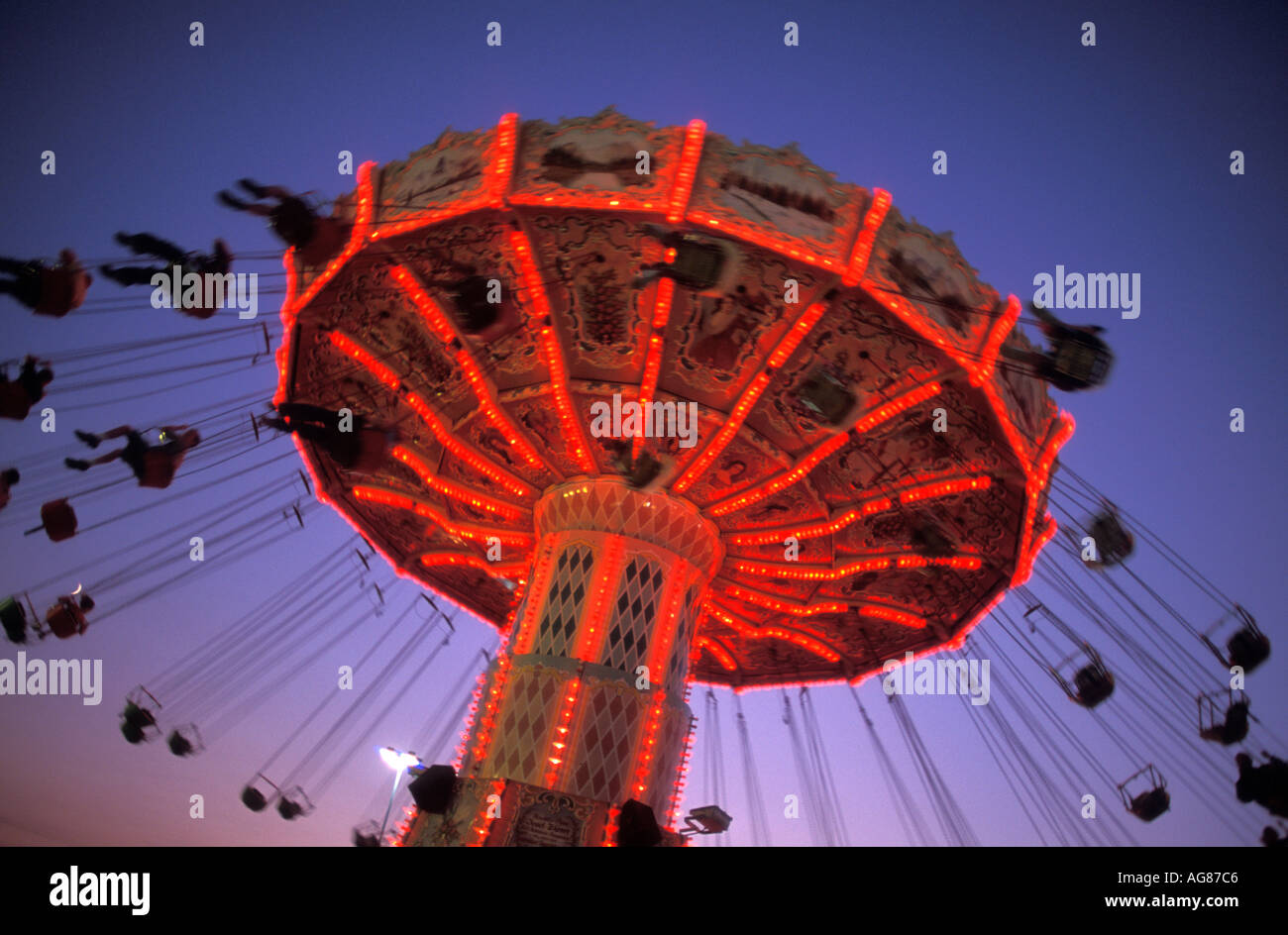 Spinning chair fun fair hi-res stock photography and images - Alamy