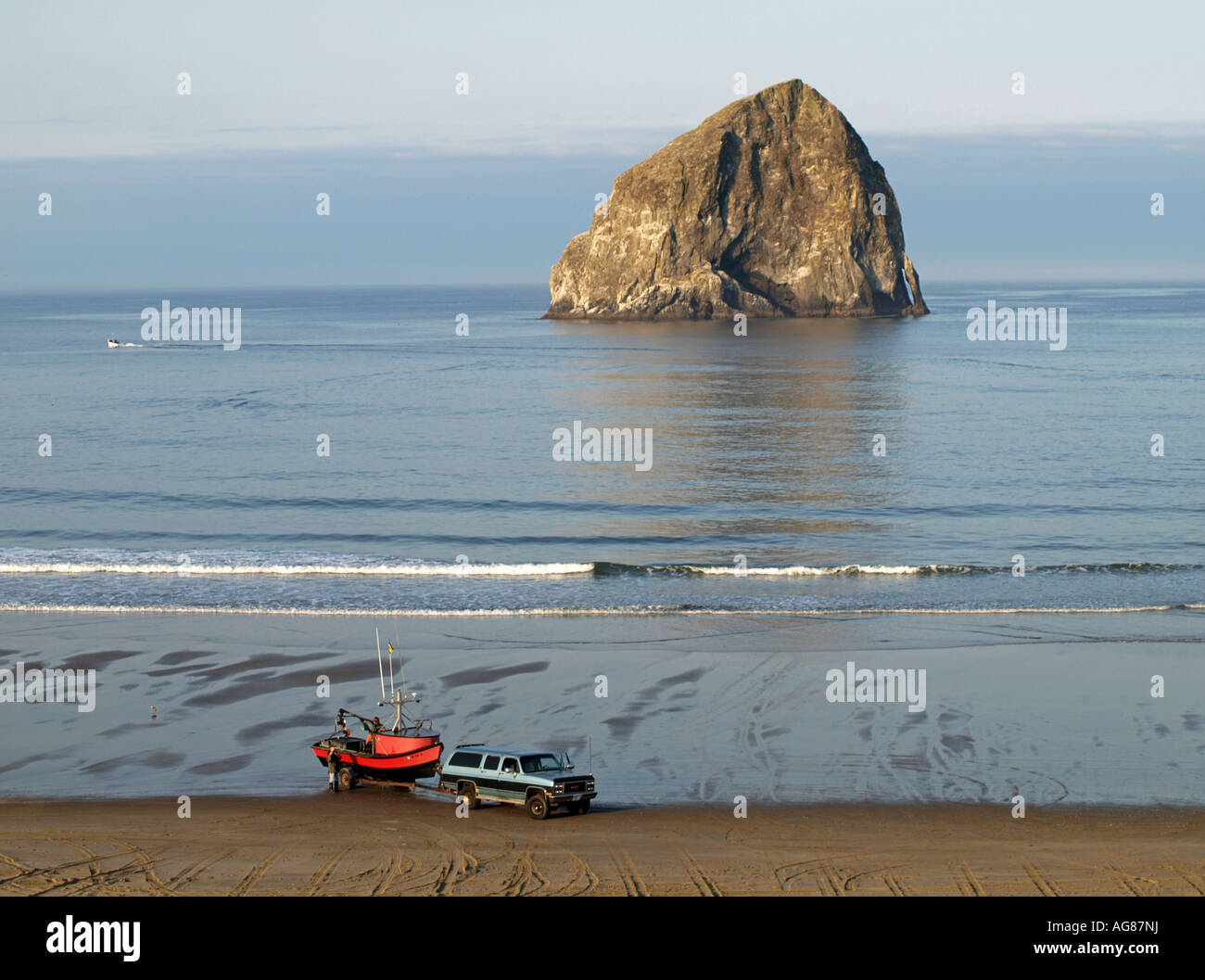 A view of the Pacific City dory fishing fleet launching from the beach ...