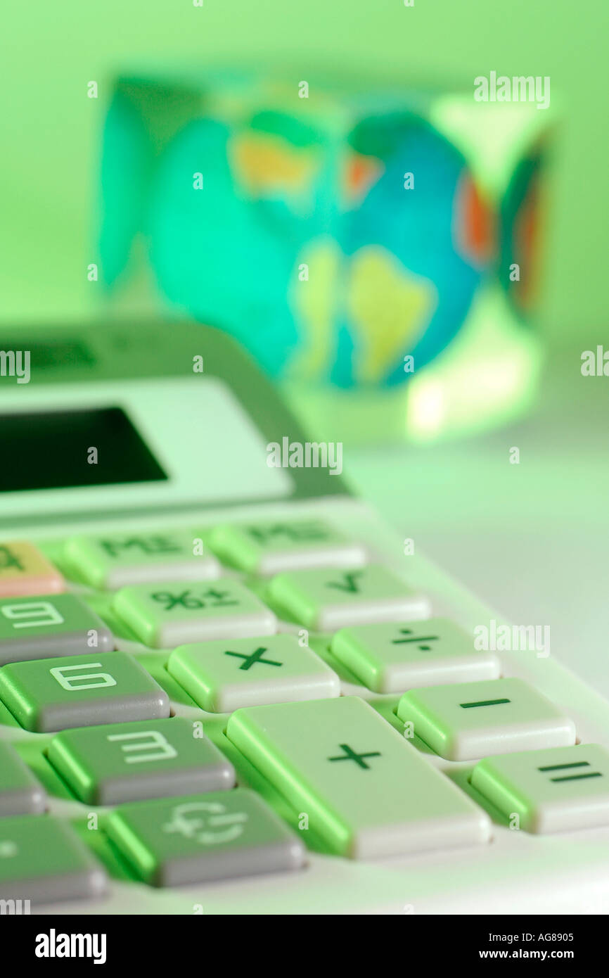 Calculator and Globe Paperweight Stock Photo - Alamy