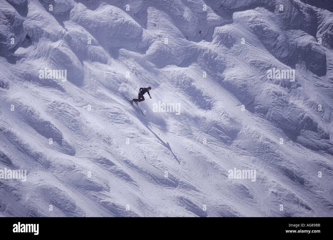 On the ski piste in Austria Descending through moguls bumps Stock Photo ...