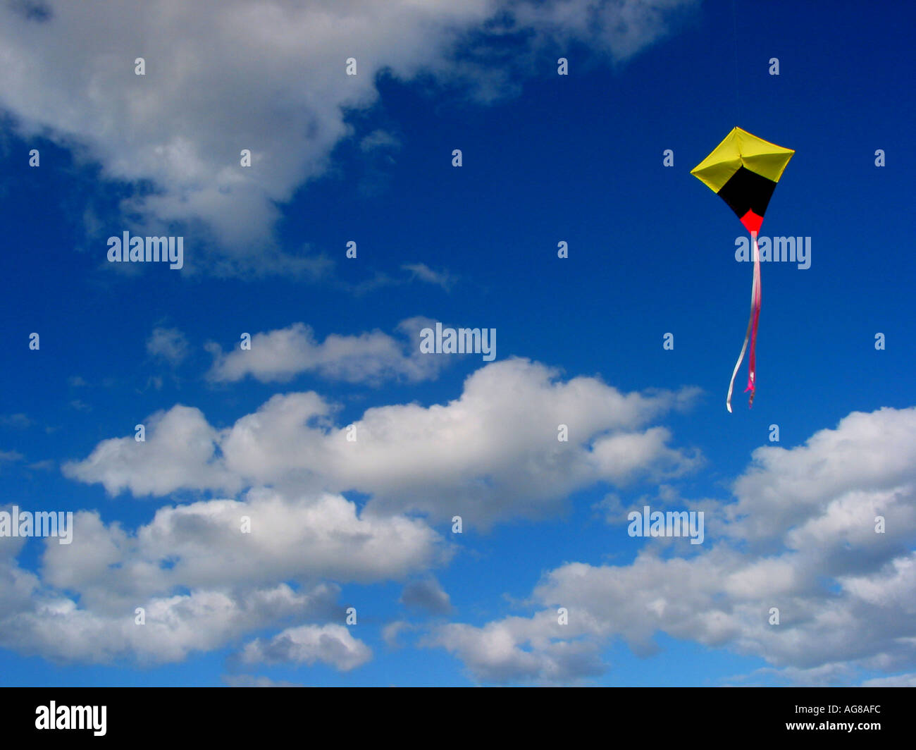 Flying kite in blue sky with clouds High resolution digital camera ...