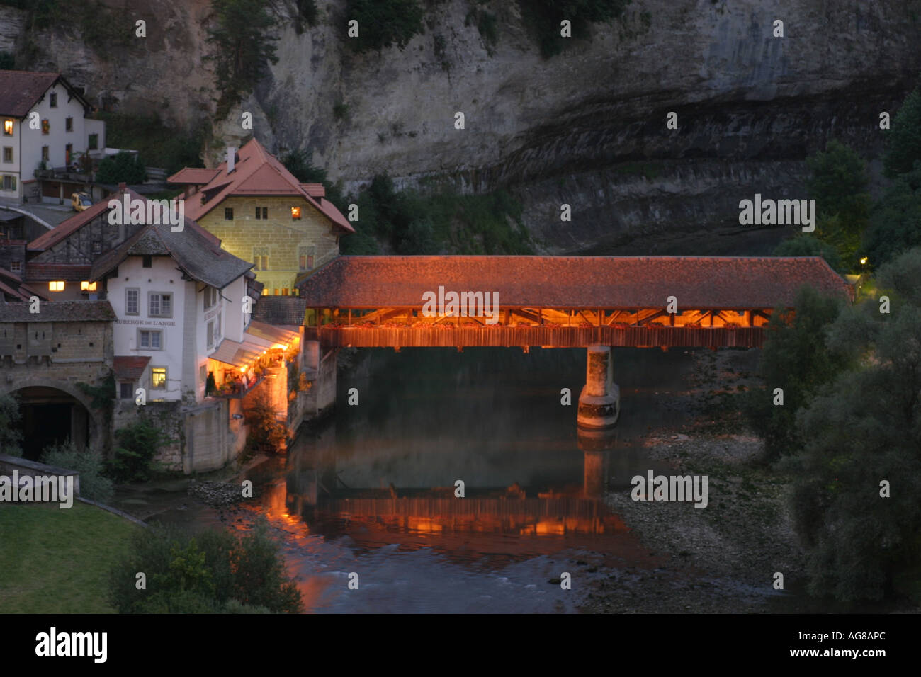 Covered bridge over the Saane River, border of the famous "Roestigraben ...