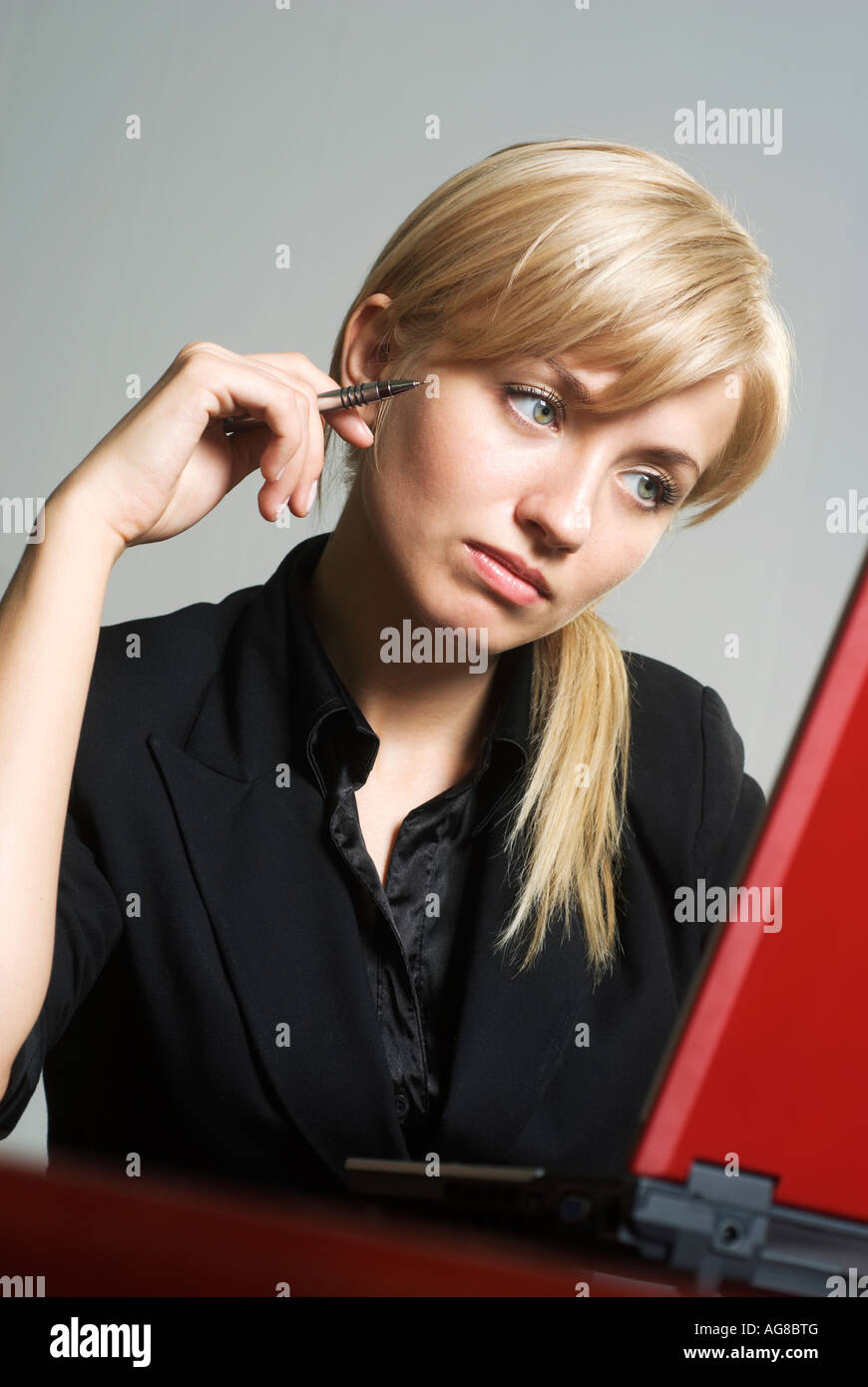 Woman at computer Stock Photo - Alamy