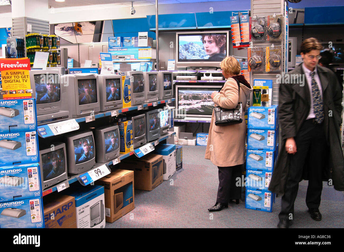 Televisions and electrical goods at Dixons store London UK Stock Photo ...
