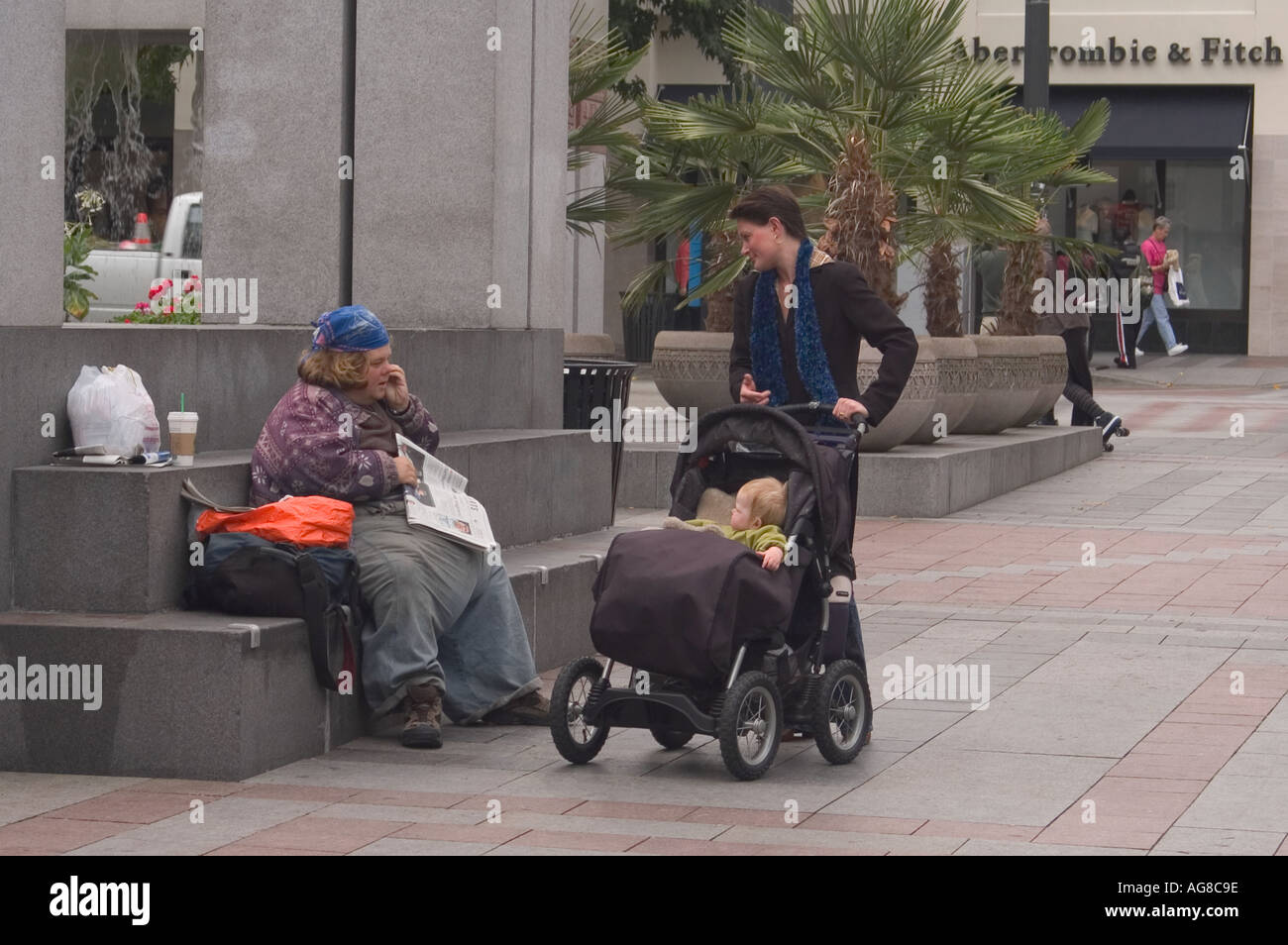 Homeless Woman Talking with Mother and Child in Downtown Seattle ...