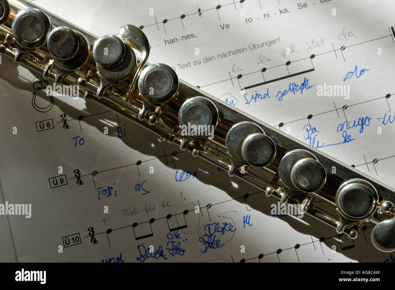 Flute and sheet of music Stock Photo - Alamy