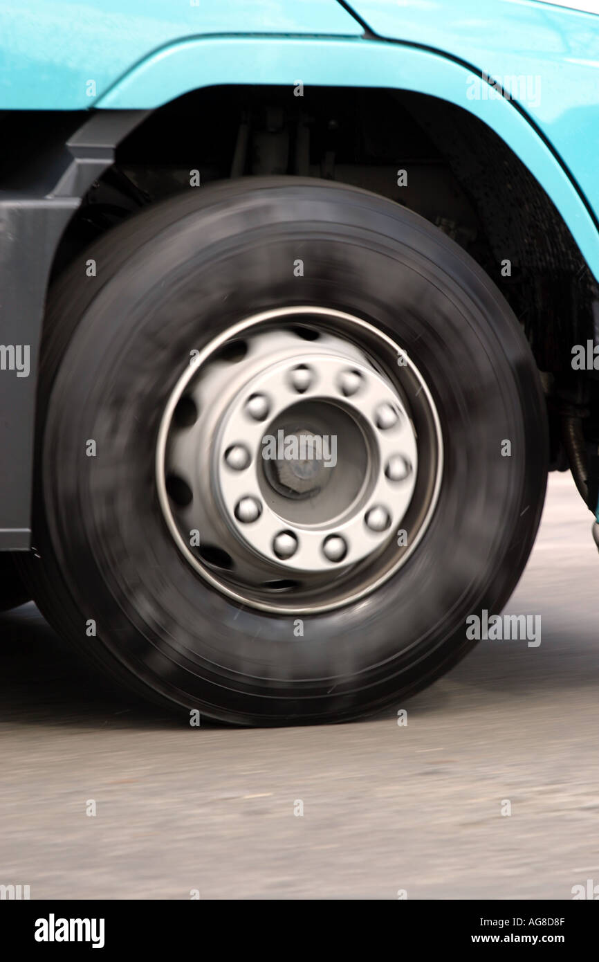 Spinning front wheel of a truck Stock Photo - Alamy
