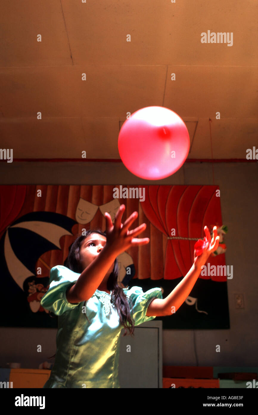 HONDURAS GIRL PLAYING WITH A BALLOON TEGUCIGALPA Photo Julio Etchart ...