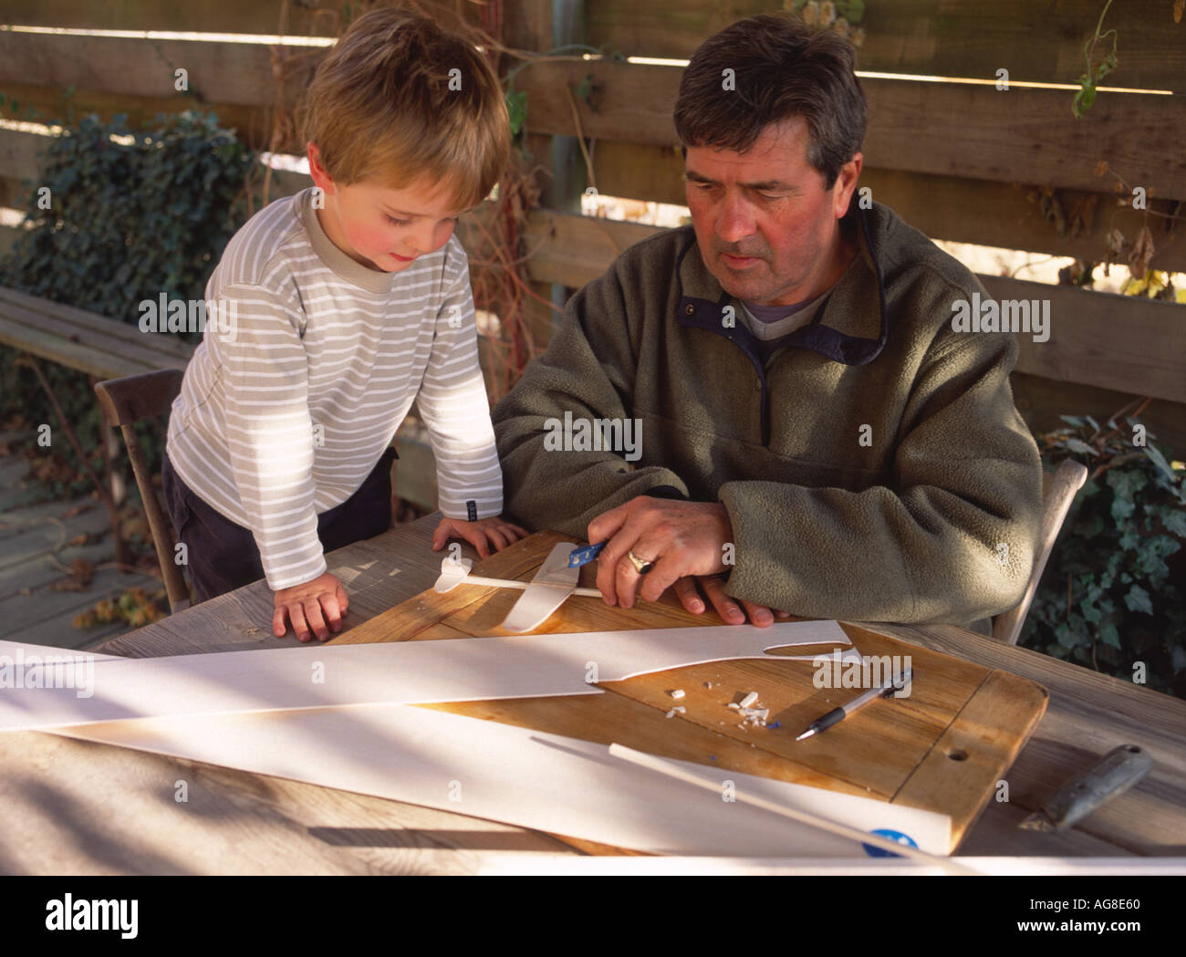Boy building model airplane hi-res stock photography and images - Alamy