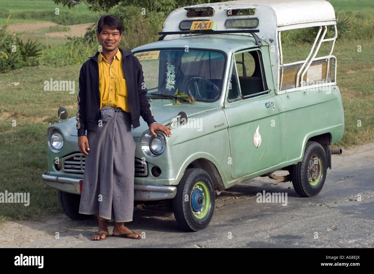 Driver standing in front of his taxi Mandalay Myanmar Stock Photo - Alamy
